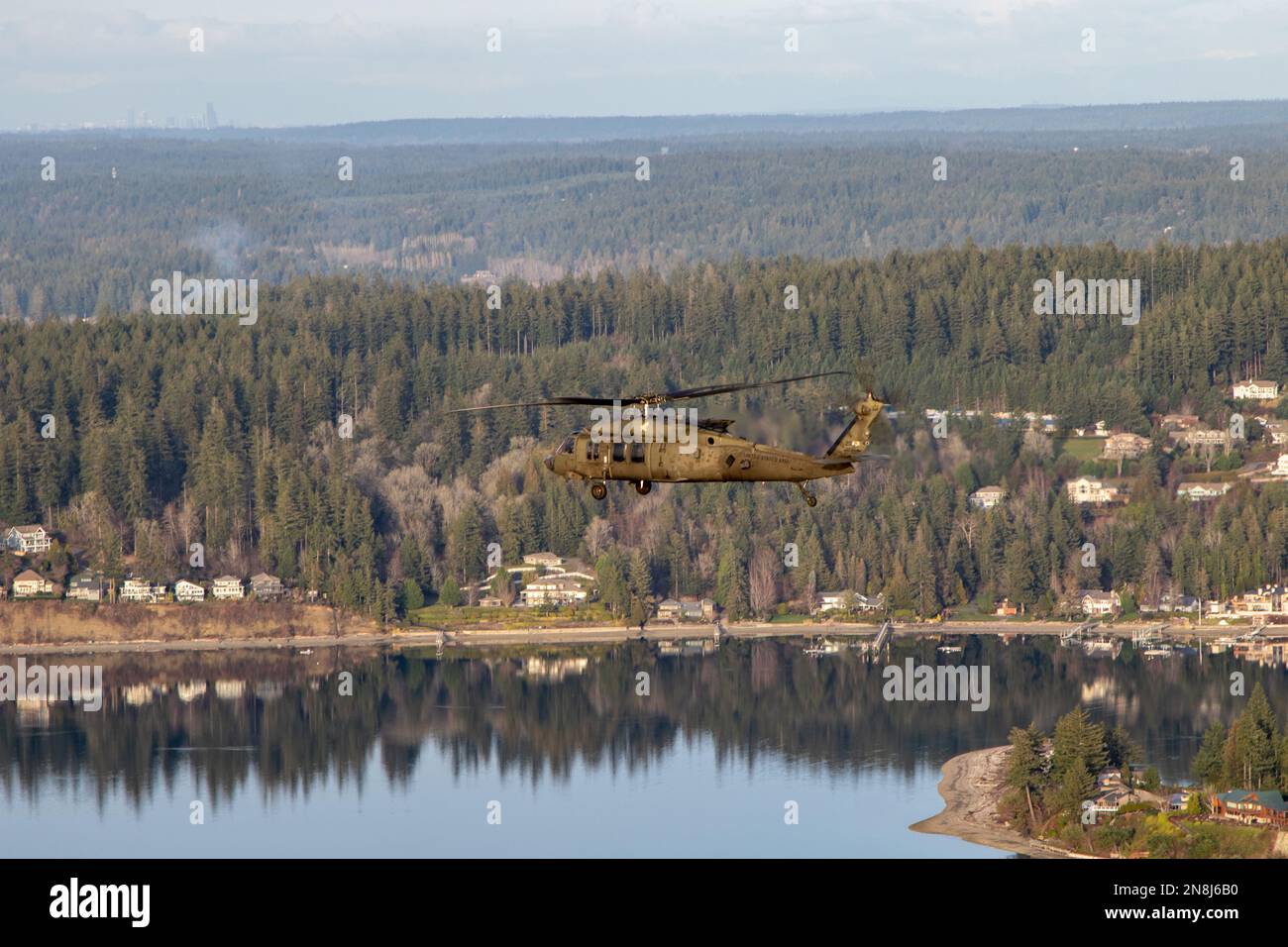 A UH-60M Black Hawk helicopter assigned to Charlie Company, 2-158 ...