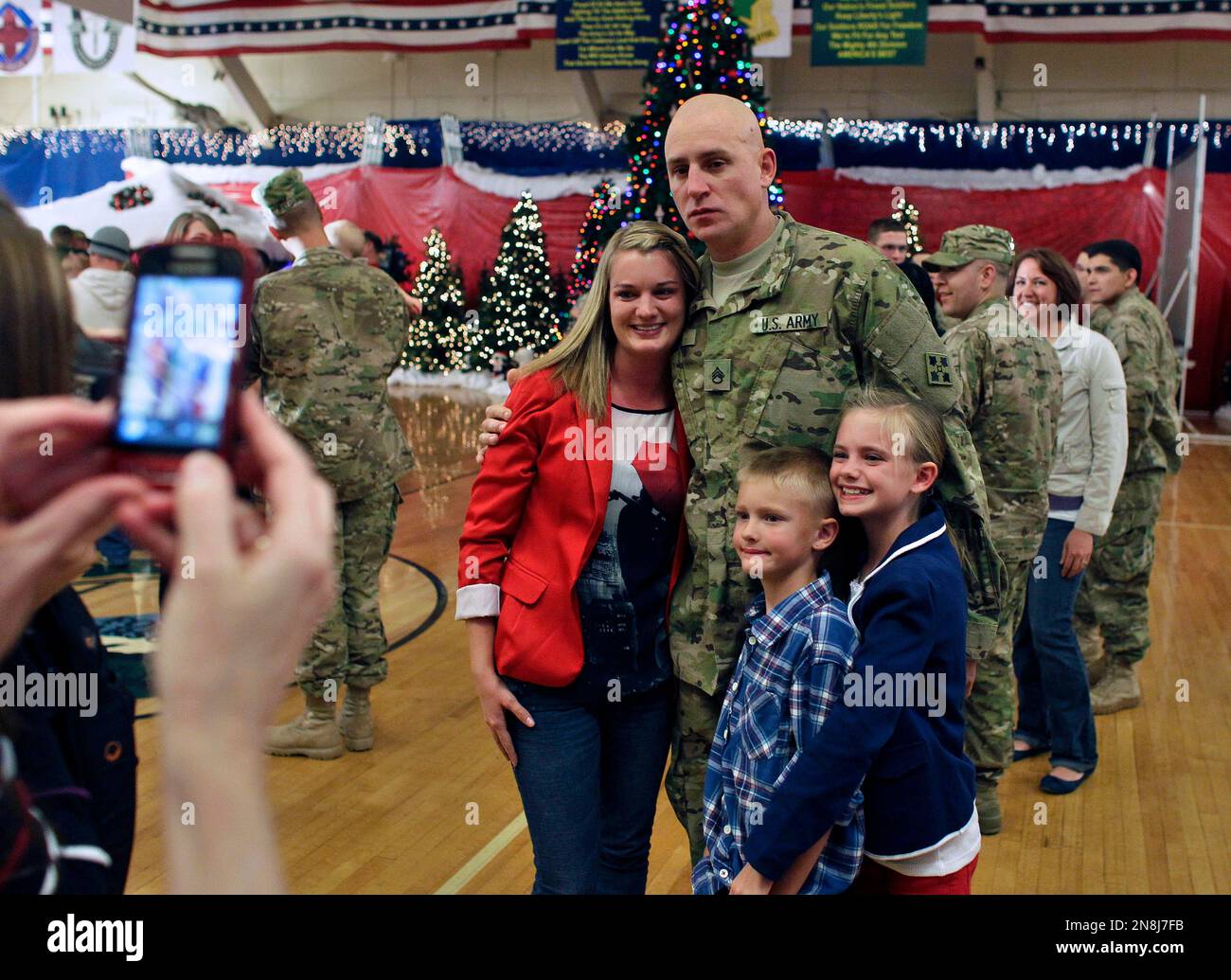 Staff Sgt. Mitchell Liming poses for a picture with his wife Candice ...