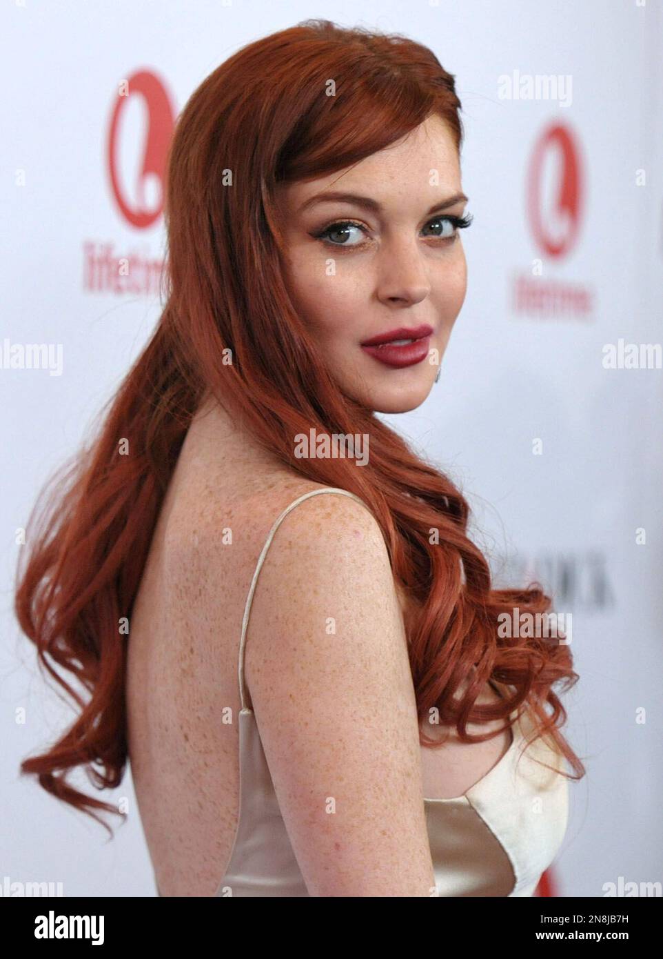 Lindsay Lohan attends a dinner celebrating the premiere of "Liz & Dick ...