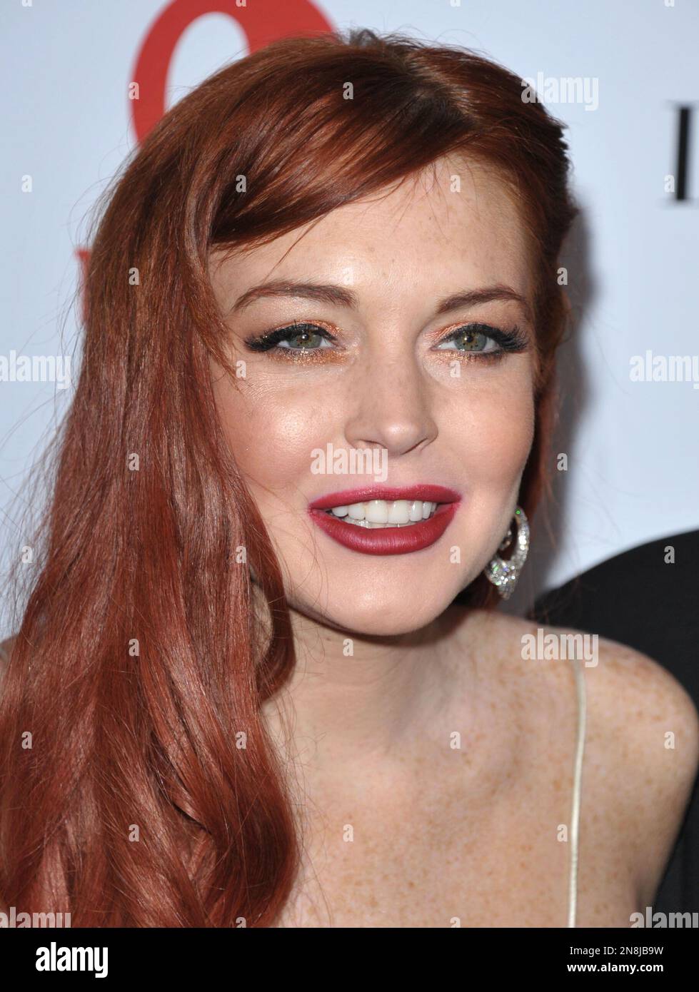 Lindsay Lohan attends a dinner celebrating the premiere of "Liz & Dick ...