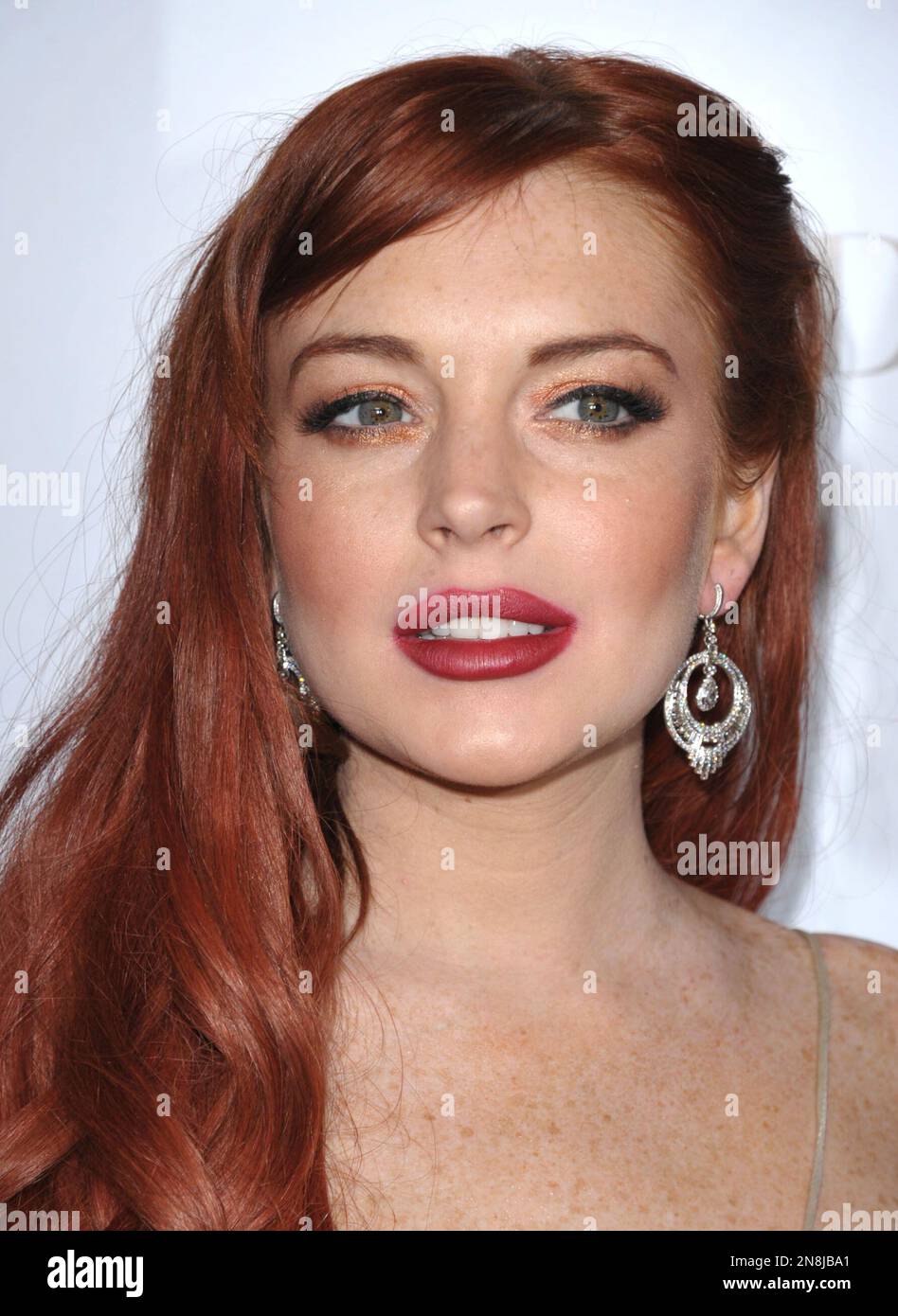 Lindsay Lohan attends a dinner celebrating the premiere of "Liz & Dick ...