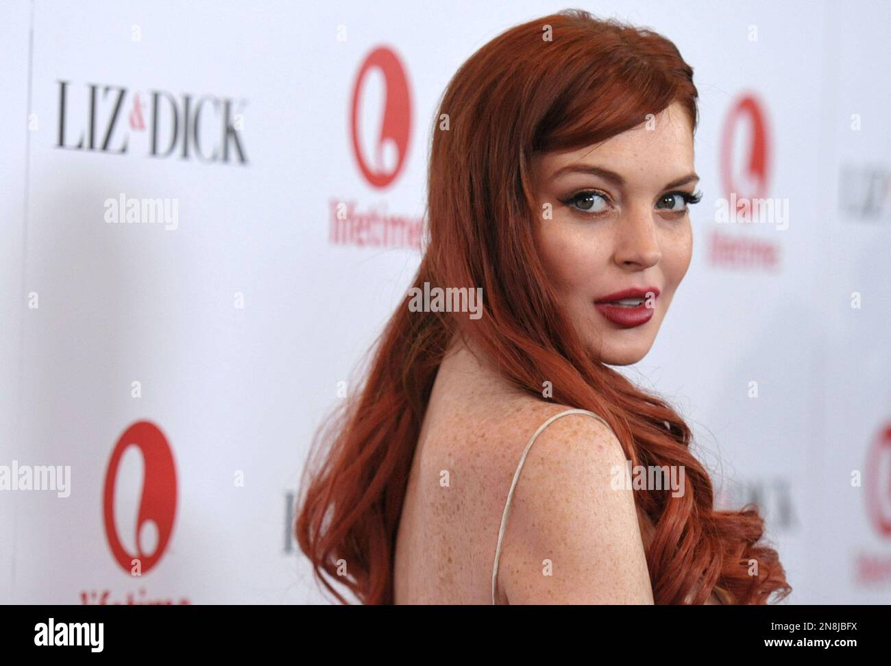 Actress Lindsay Lohan attends a dinner celebrating the premiere of "Liz ...