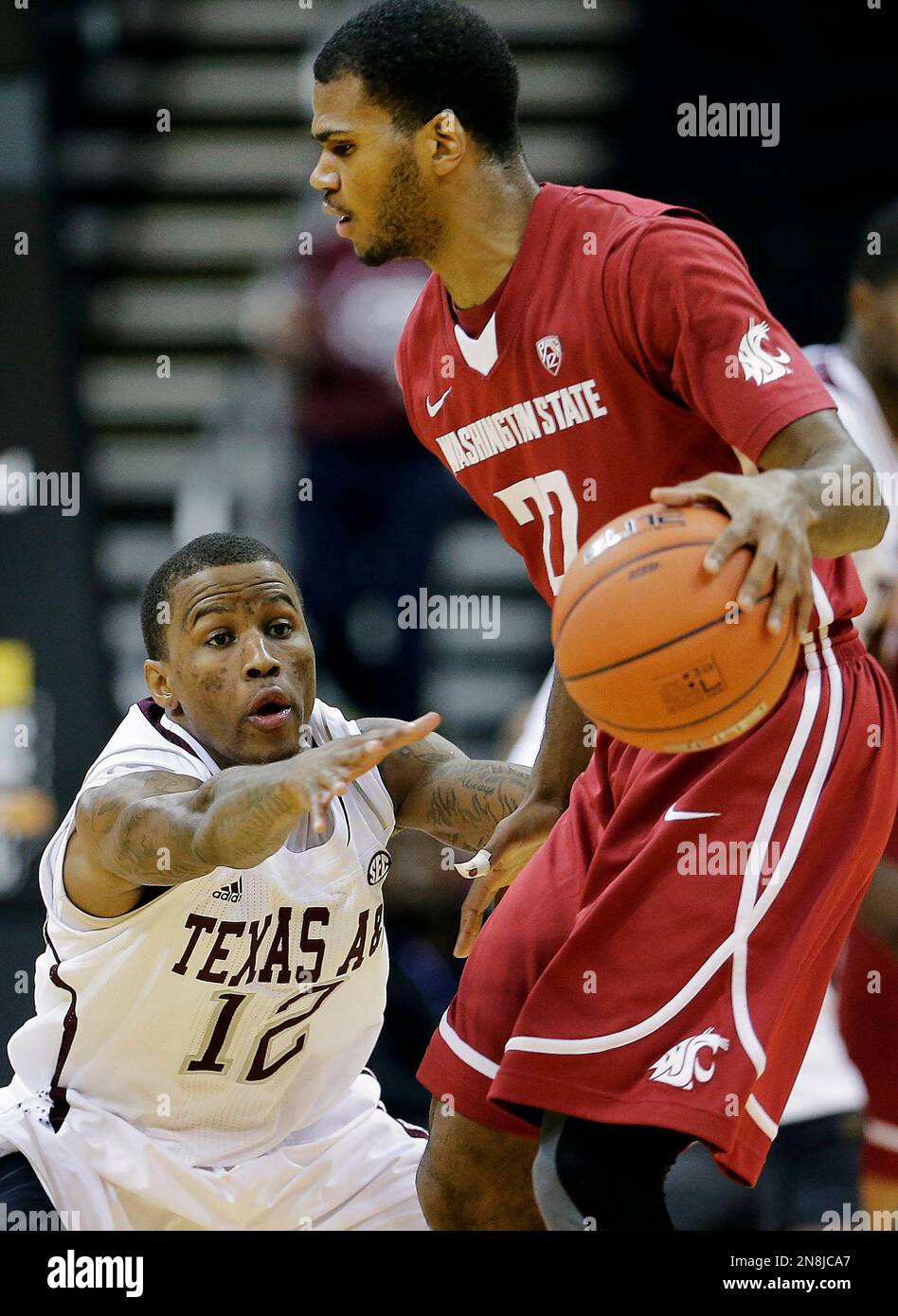 Texas A&M guard Fabyon Harris (12) pressures Washington State guard ...