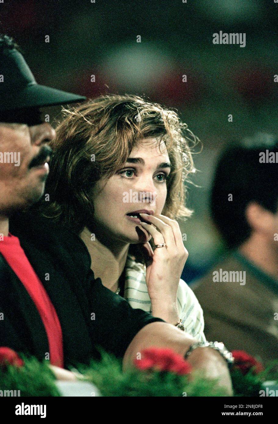 Actress/model Brooke Shields bites her nails while watching Andre ...