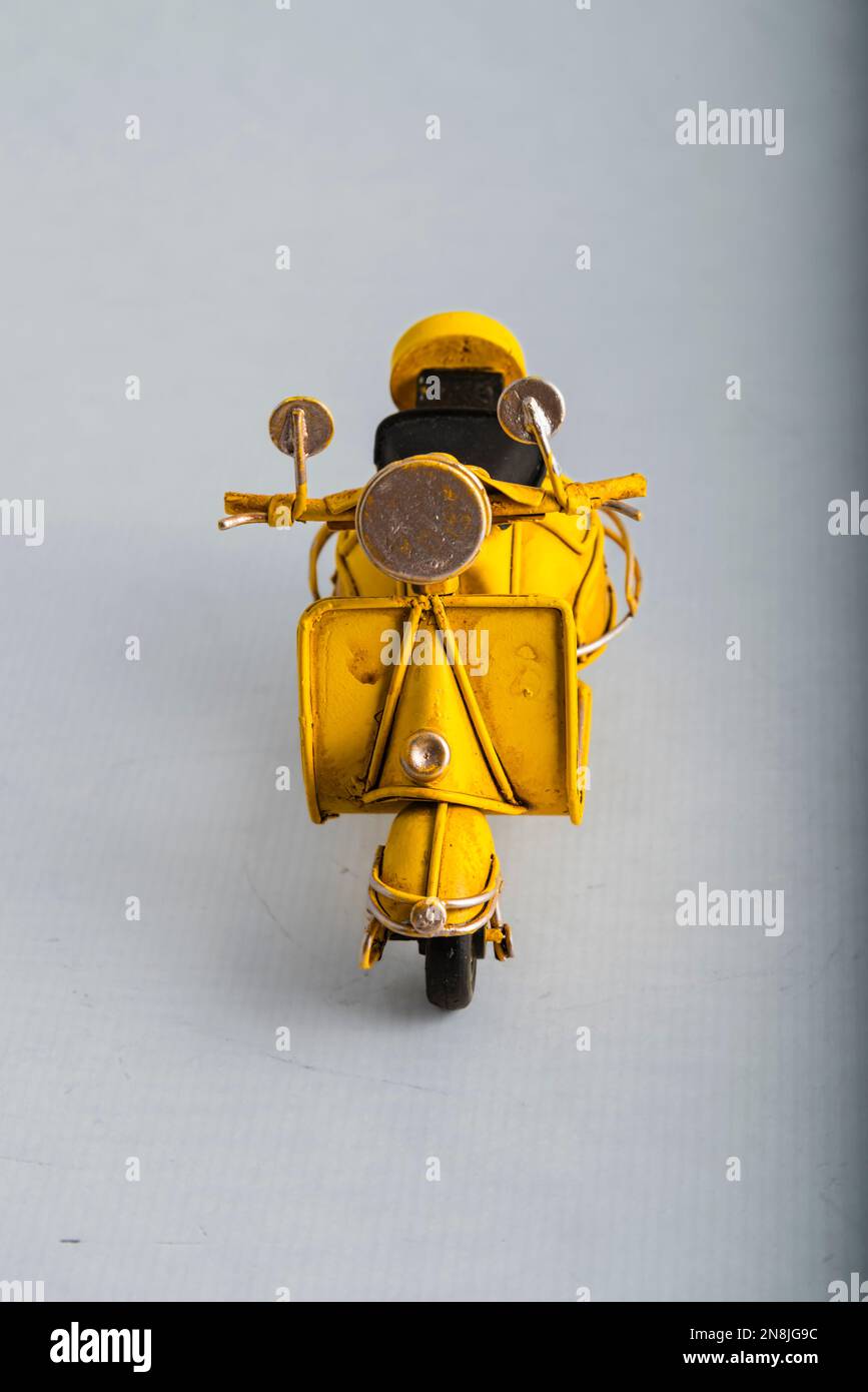 The photograph of a yellow motorcycle vintage collection figures in ...