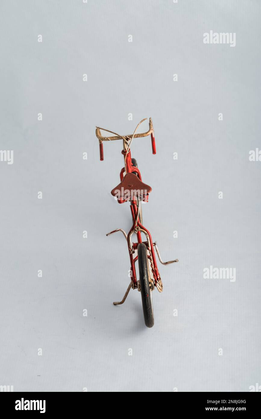 the photograph of a red bicycle metal vintage collection figures Stock ...