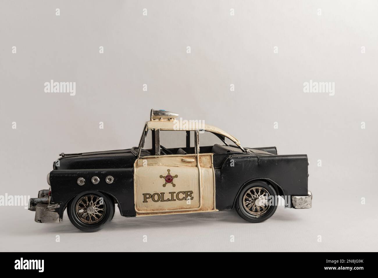 photograph of an old metal police car for decoration vintage iron ...