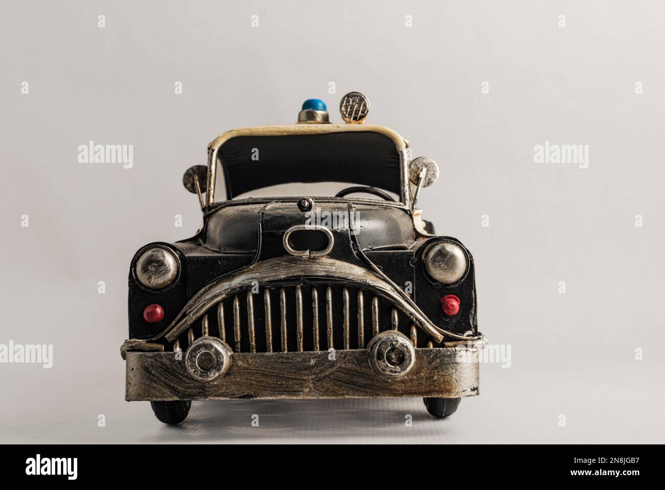 photograph of an old metal police car for decoration vintage iron ...