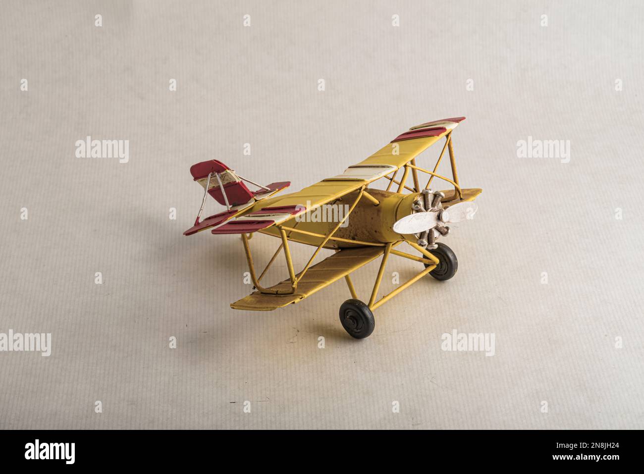 The photograph of a plane from the First World War in yellow steel ...