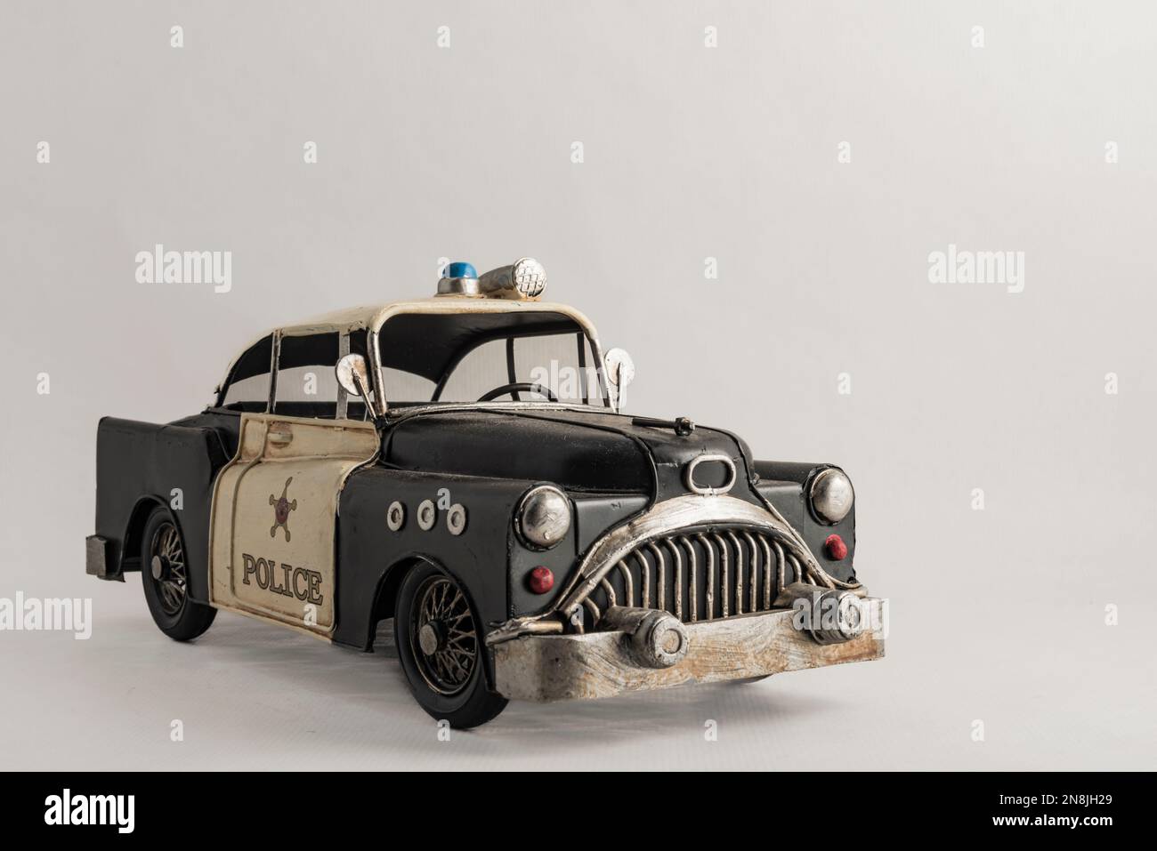 photograph of an old metal police car for decoration vintage iron ...