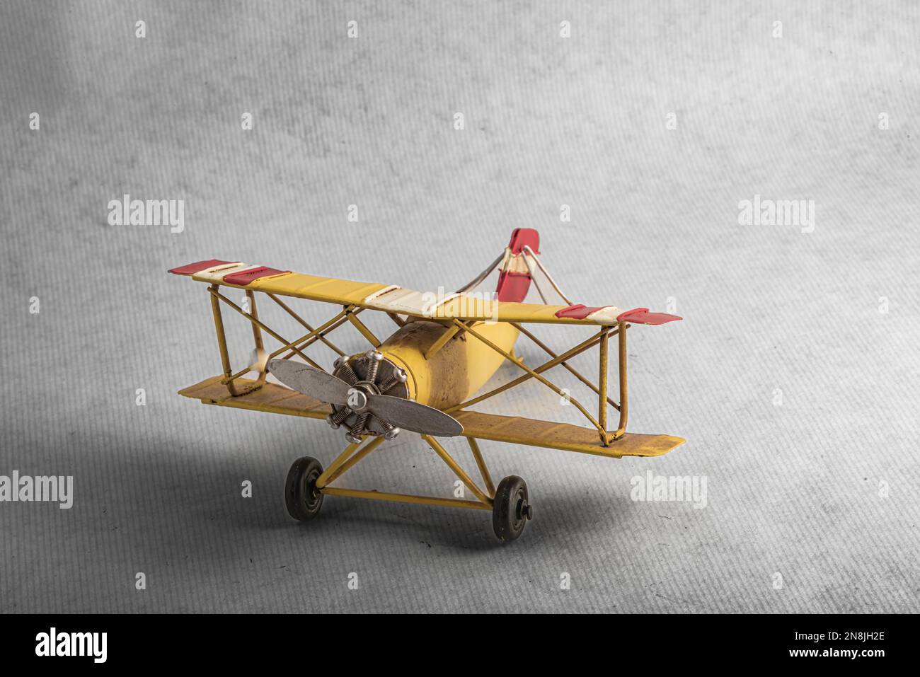 The photograph of a plane from the First World War in yellow steel ...