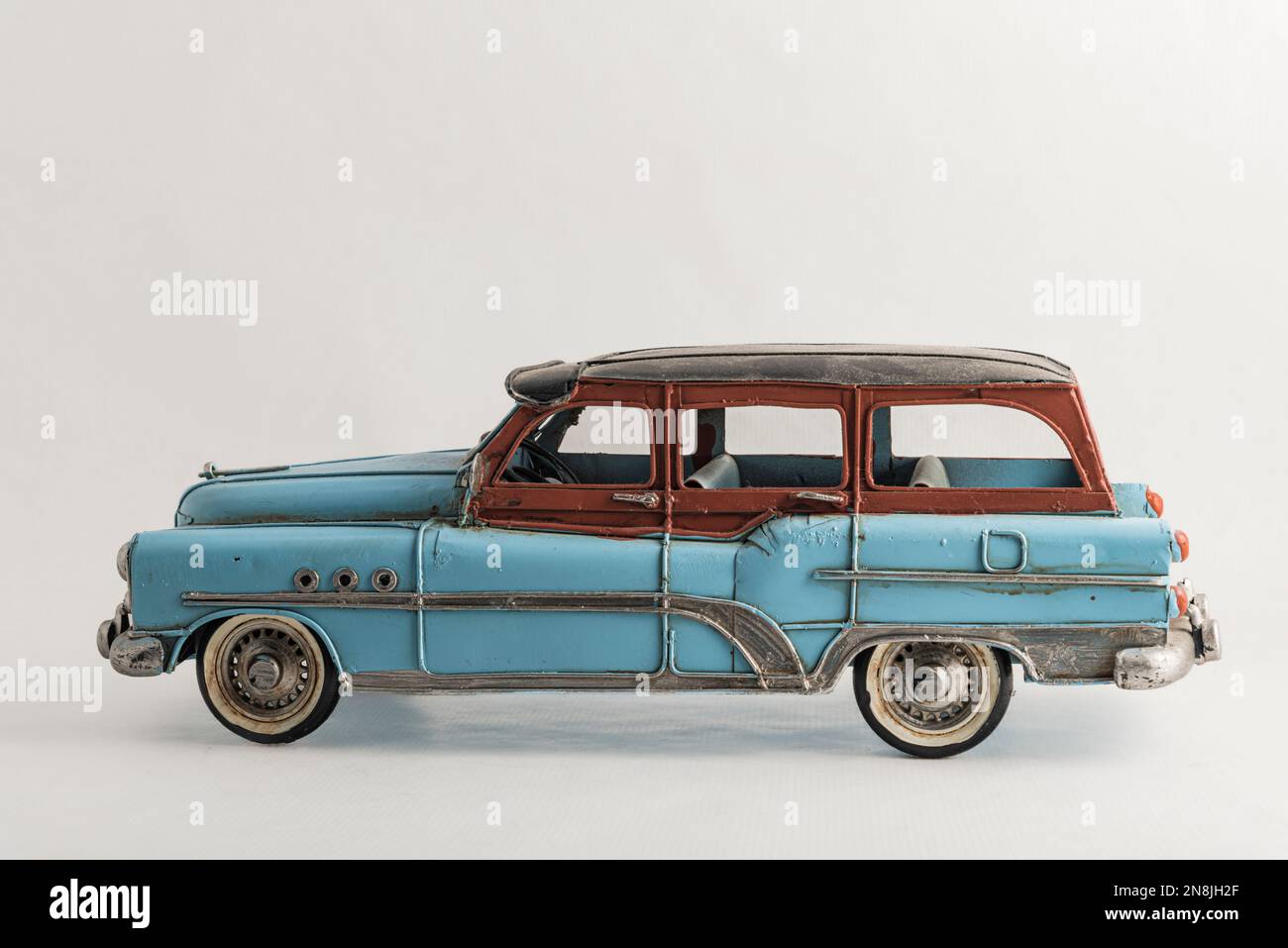 The photograph of an old blue car vintage metal figures for collection ...
