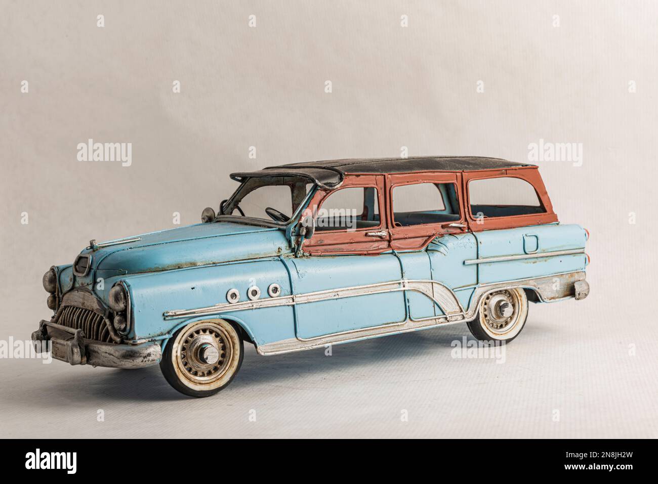 The photograph of an old blue car vintage metal figures for collection ...