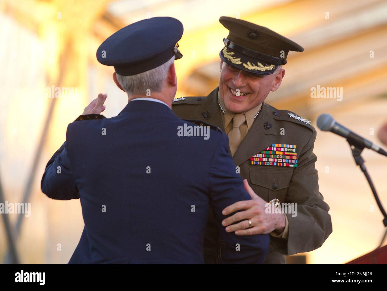 Gen. Douglas Fraser, left, hugs the new Southern Command commander, Gen ...