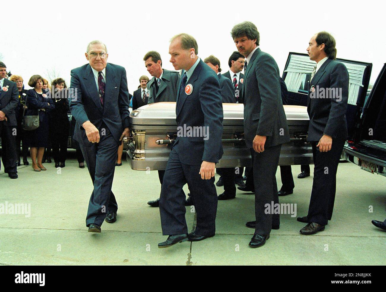 Pallbearers carry the casket of NASCAR Winston Cup champion Alan ...