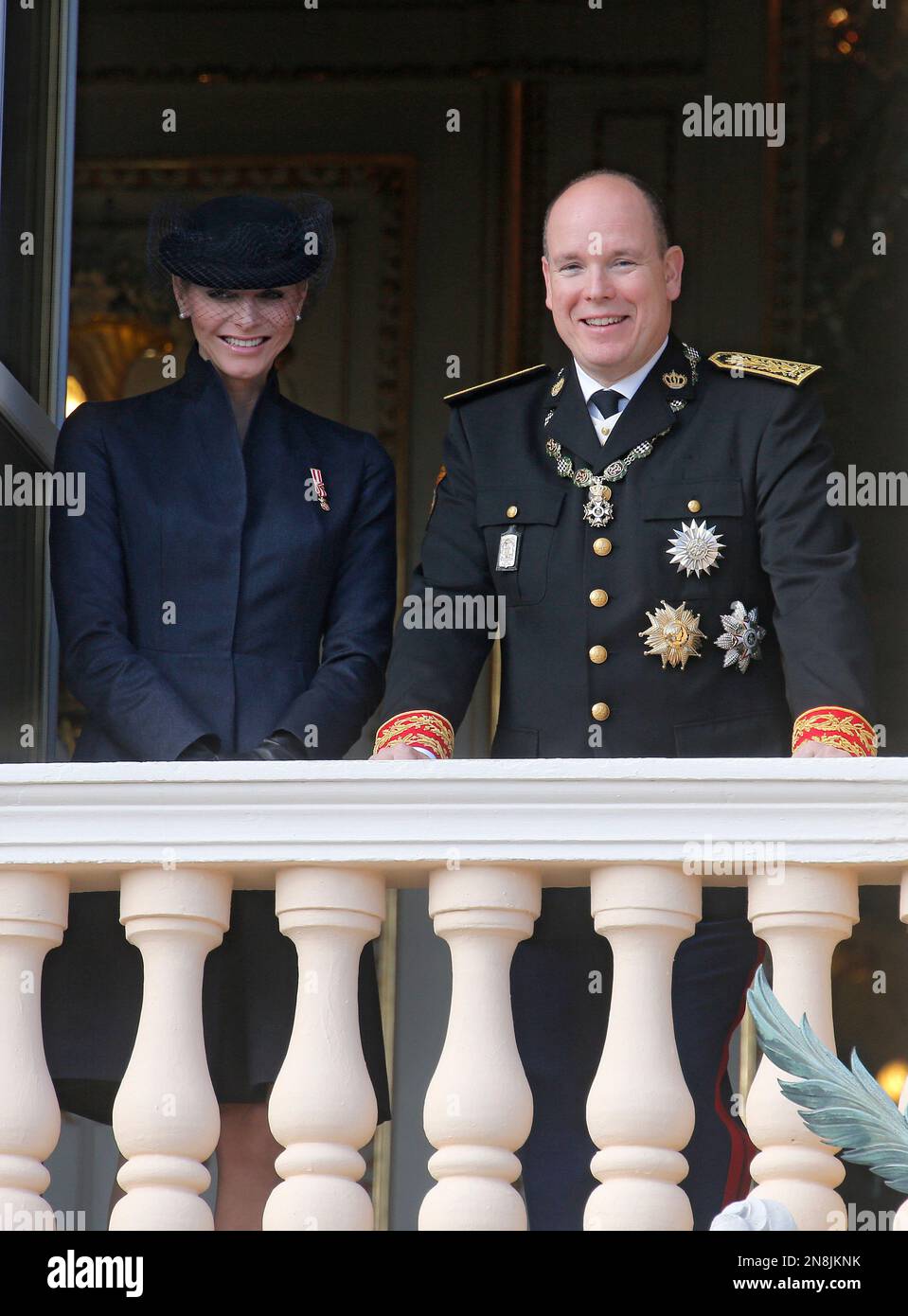 Prince Albert II of Monaco with his wife Princess Charlene smile from ...