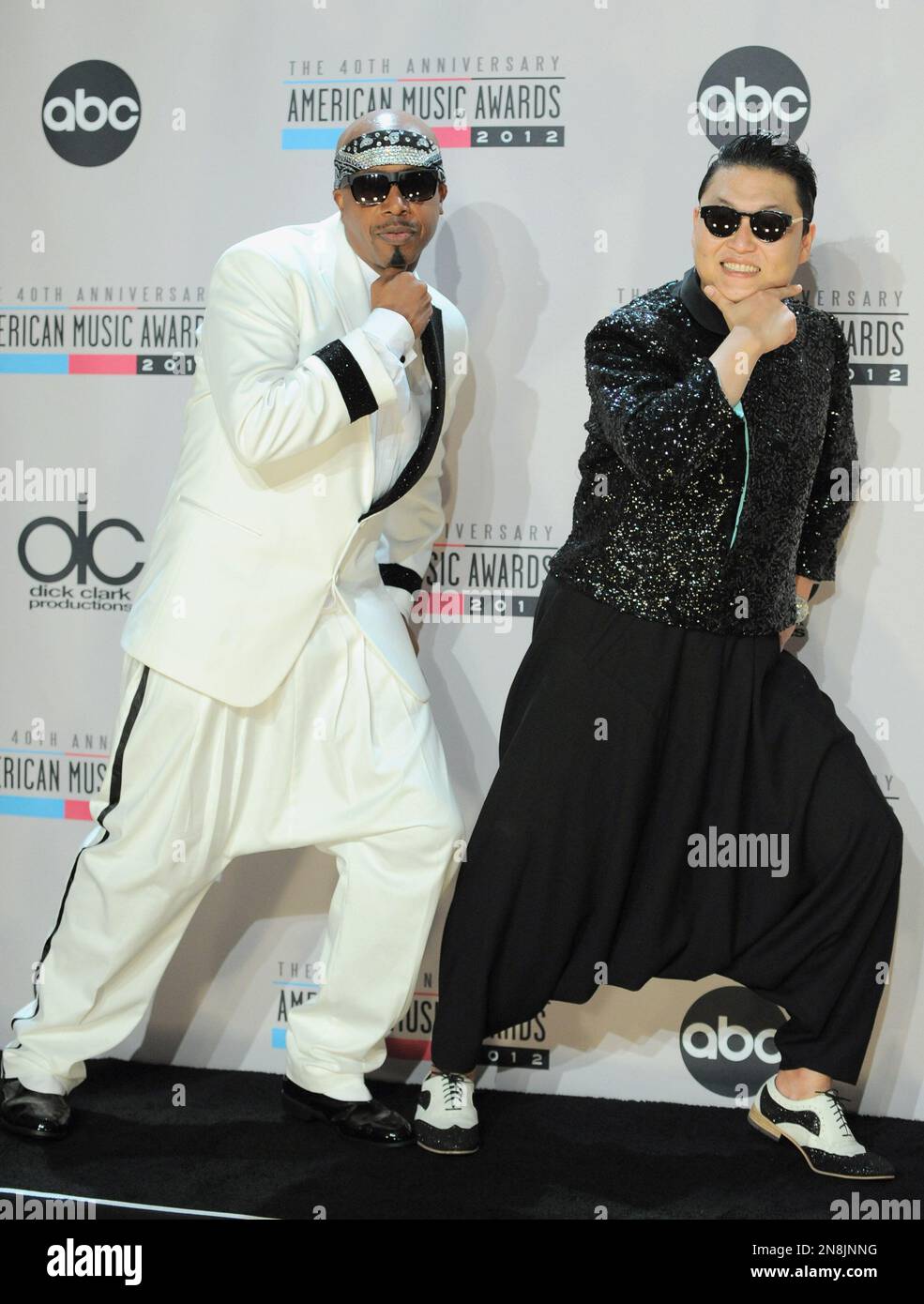 MC Hammer, left, and Psy pose backstage at the 40th Anniversary ...