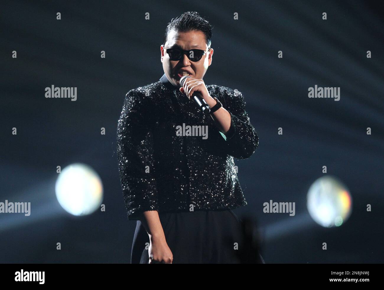 Psy performs at the 40th Anniversary American Music Awards on Sunday ...