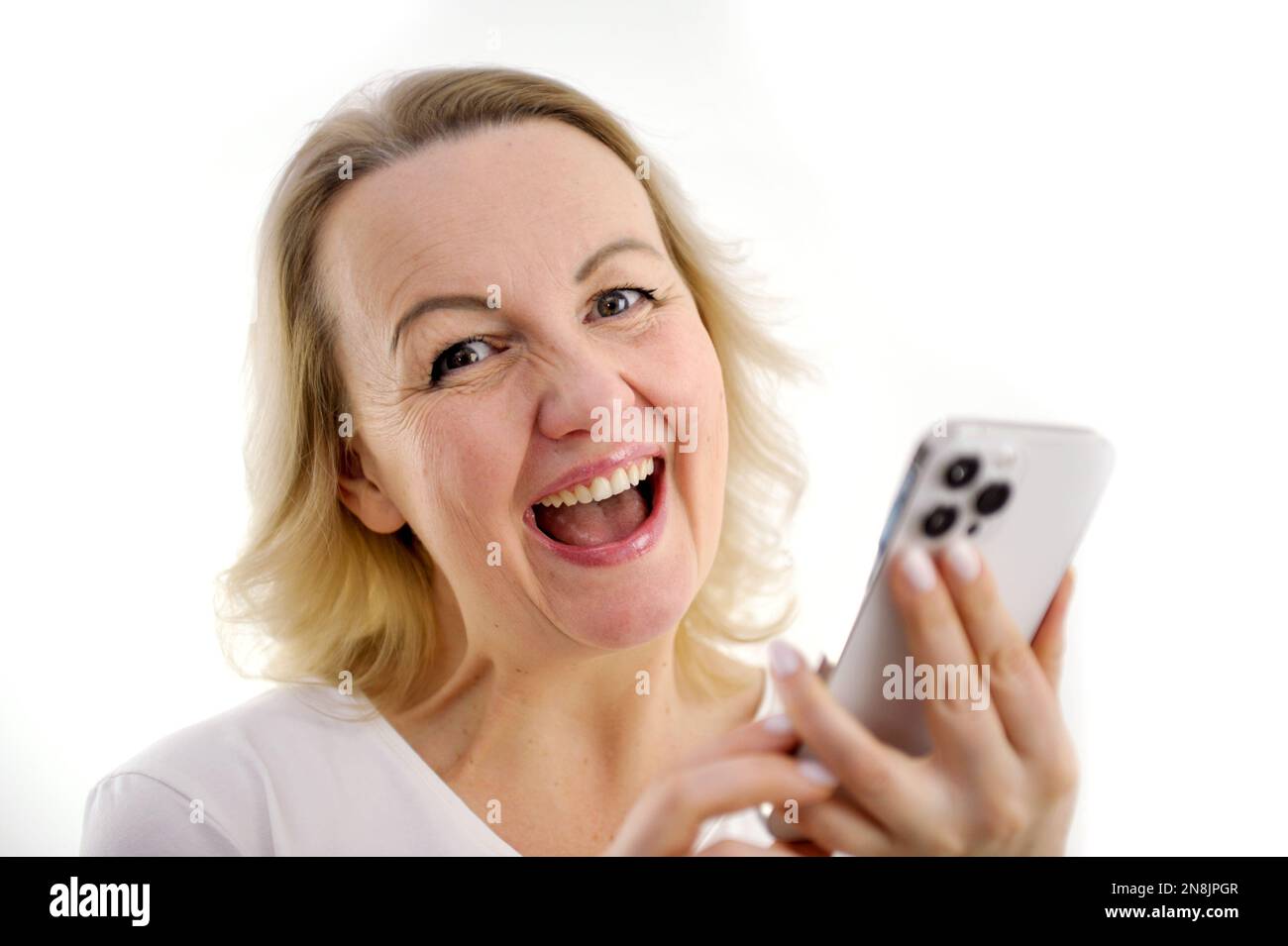 Blonde female with a nice appearance looks terrible expression in a ...