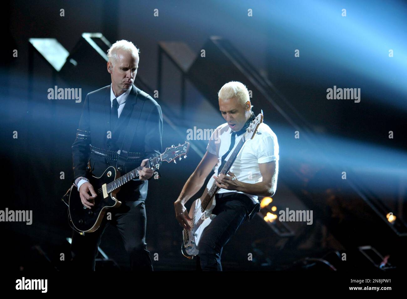 Tom Dumont, left, Tony Kanal and No Doubt perform “Looking Hot” at the ...