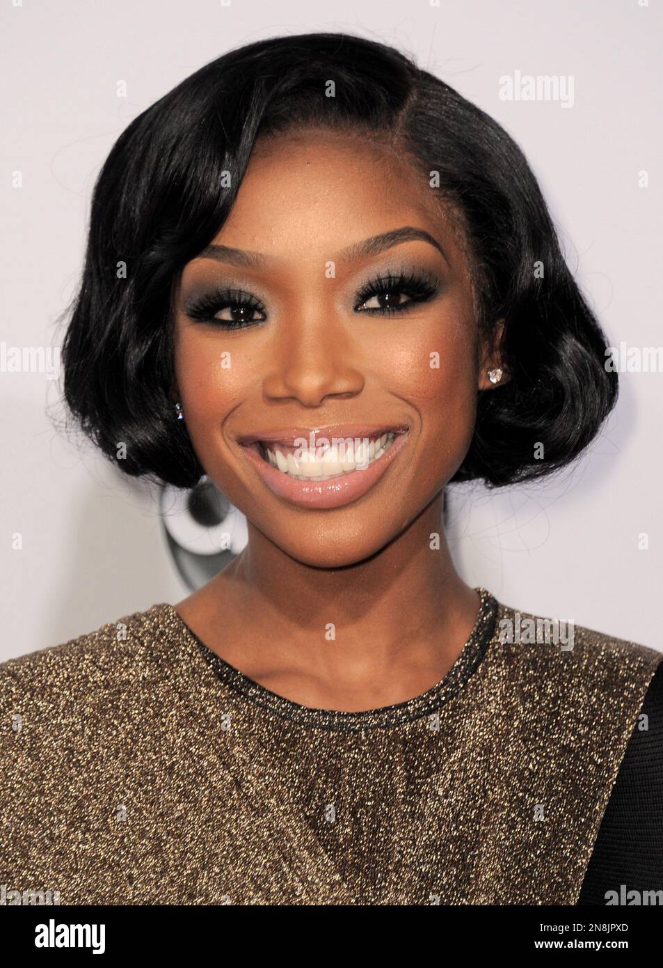 Brandy arrives at the 40th Anniversary American Music Awards on Sunday ...