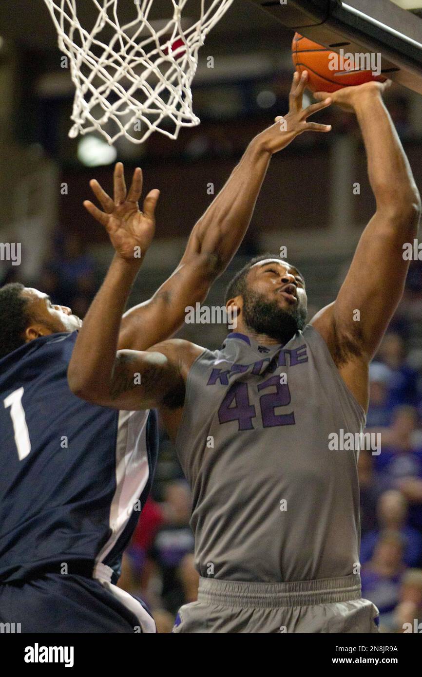 Kansas State forward Thomas Gipson (42) is covered by North Florida ...