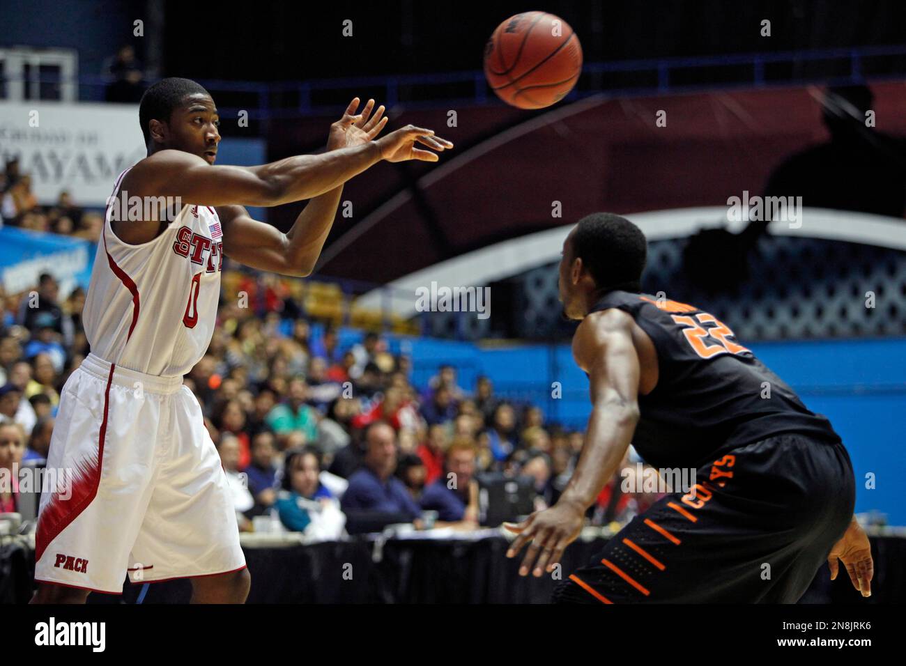 Oklahoma State’s Markel Brown, right, pressures NC State’s Rodney ...