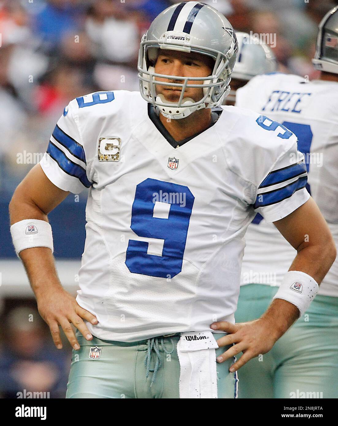 Dallas Cowboys quarterback Tony Romo (9), wears a "Salute to Service ...