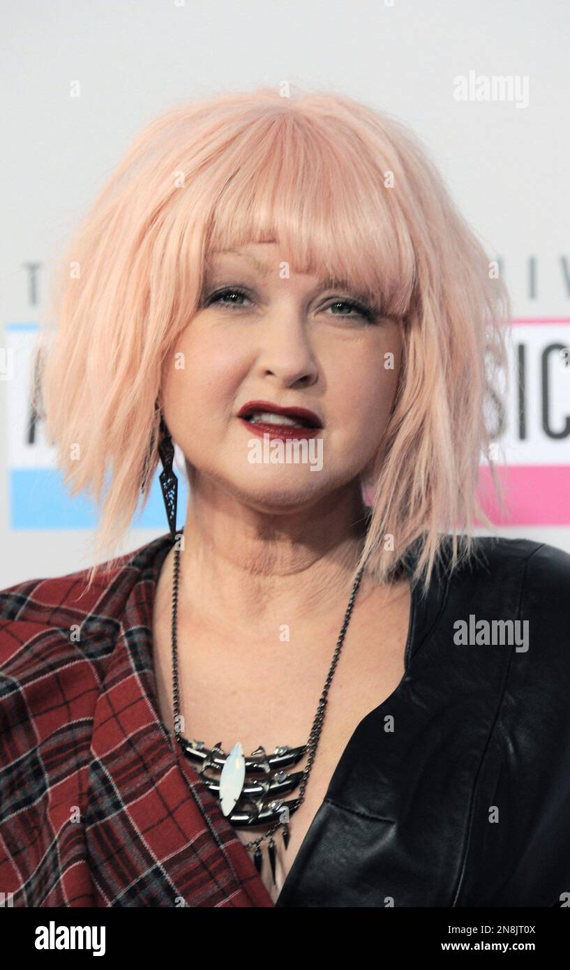 Cyndi Lauper arrives at the 40th Anniversary American Music Awards on ...