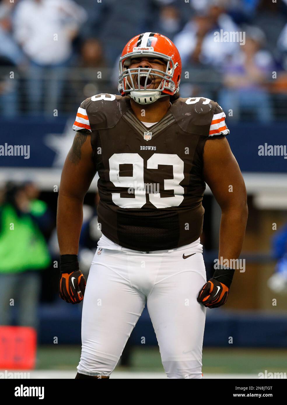Cleveland Browns defensive lineman John Hughes (93) celebrates a ...