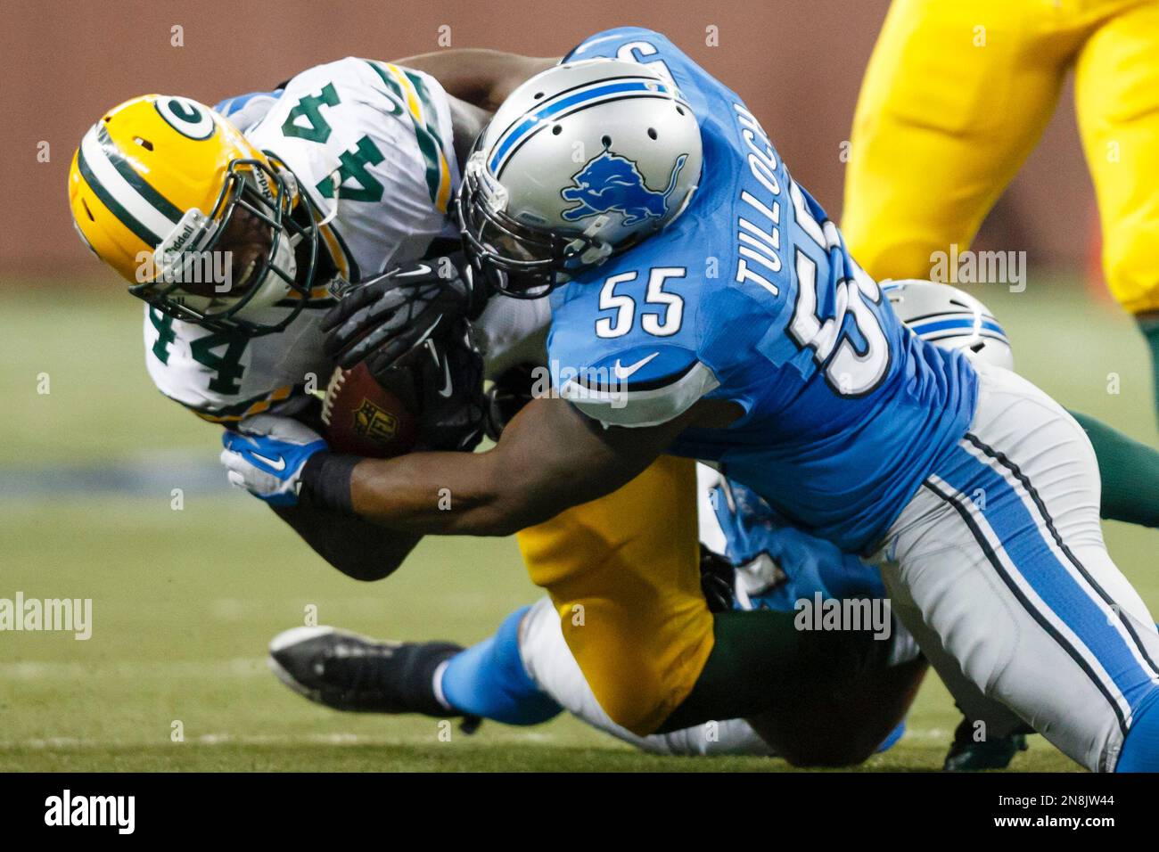 Green Bay Packers running back James Starks (44) is tackled by Detroit ...