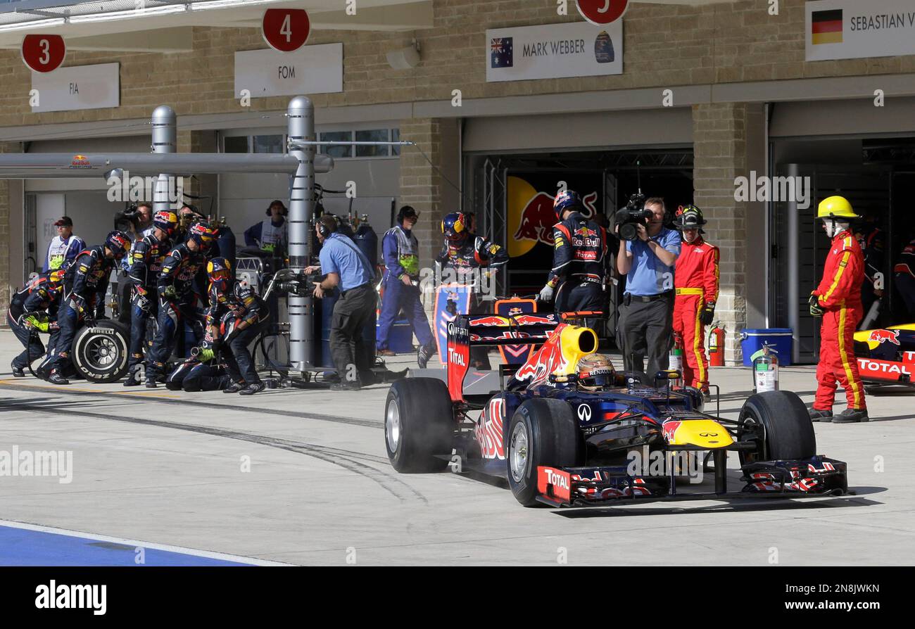 Red Bull driver Sebastian Vettel of Germany steers his car after he ...
