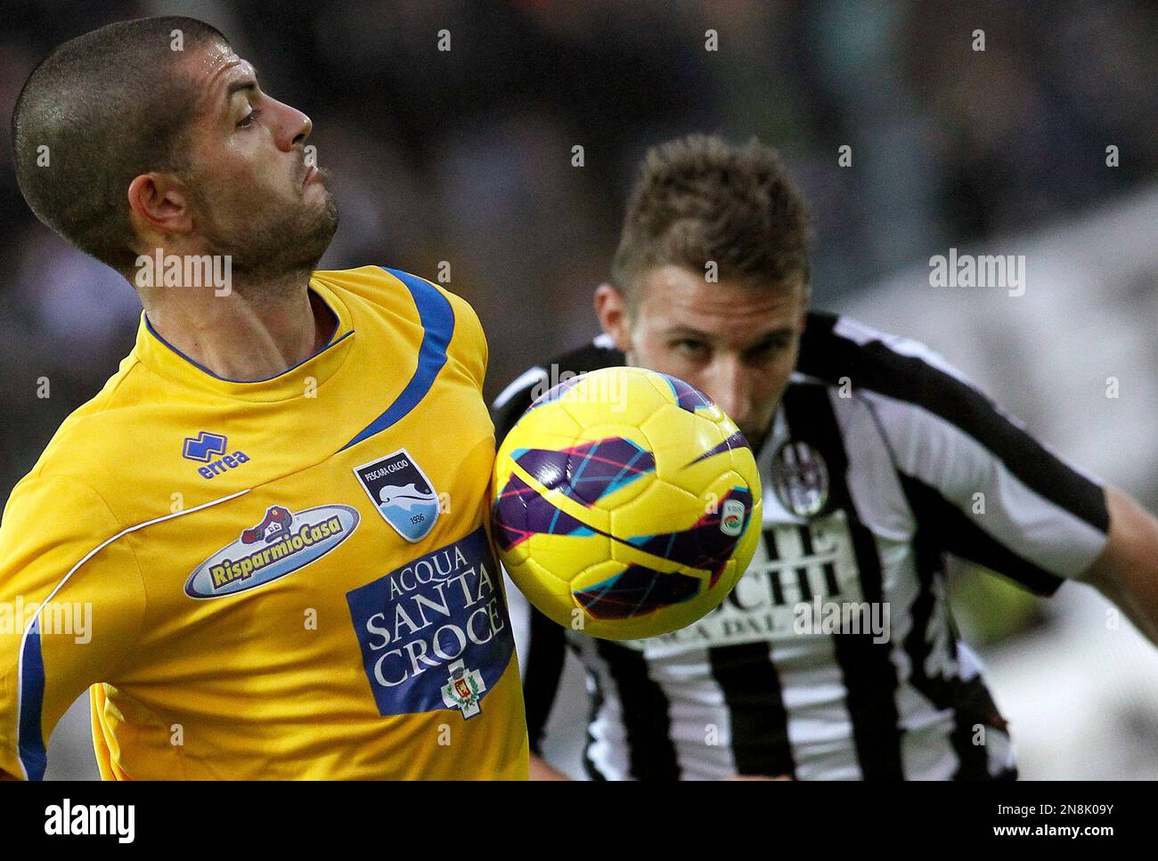Pescara's Damiano Zanon, left, and Siena's Matteo Rubin go for the ball ...