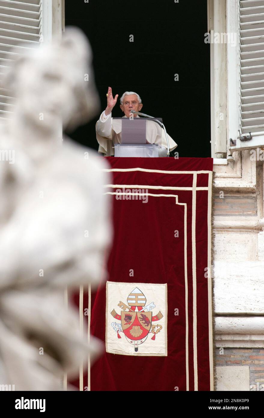 Pope Benedict XVI delivers his blessing during the Angelus noon prayer ...
