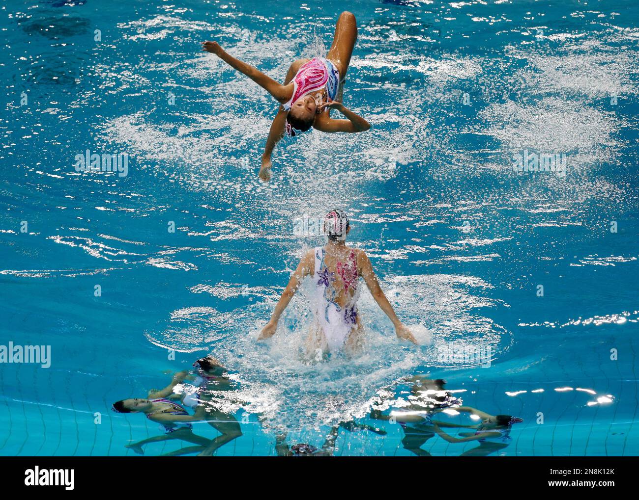 The Chinese team's performance wins a gold medal during the teams free ...