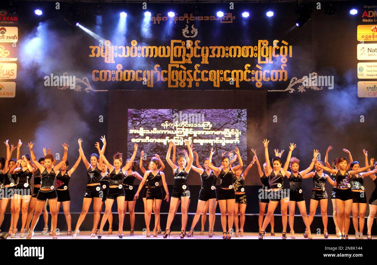 Contestants pose on stage during the Myanmar models physique ...