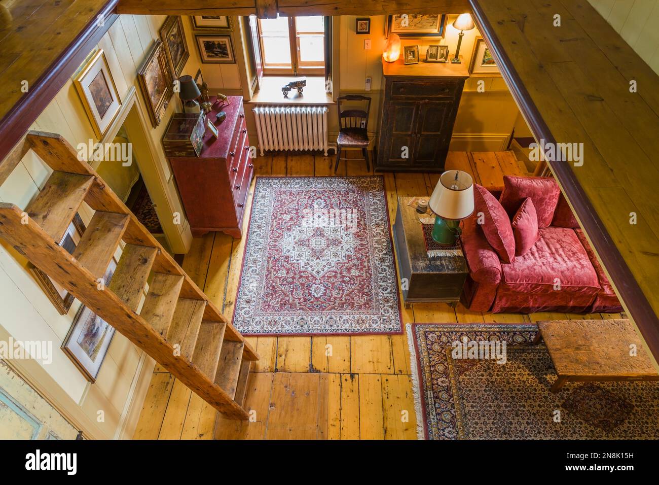 Top view of upstairs family room with wooden Miller's stairs, crimson ...