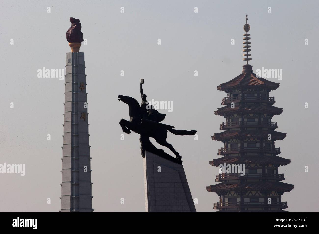 From left, replicas of the Juche Tower, statue of the Chollima, a ...