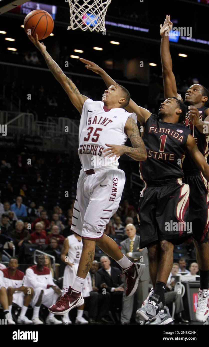 Saint Joseph's Carl Jones (35) shoots against Florida State's Devon ...
