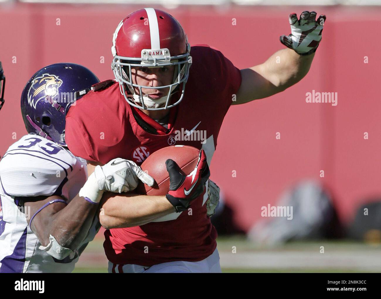 Alabama running back Ben Howell (34) is stopped by Western Carolina ...