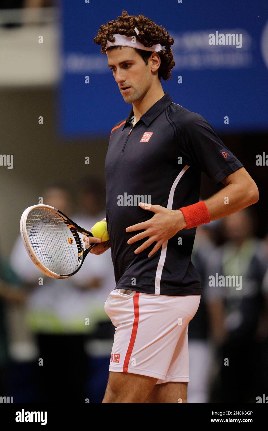 Novak Djokovic of Serbia, wears a wig and jokingly impersonates former ...
