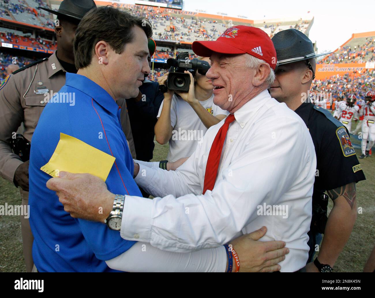 Florida head coach Will Muschamp, left, greets Jacksonville State head ...