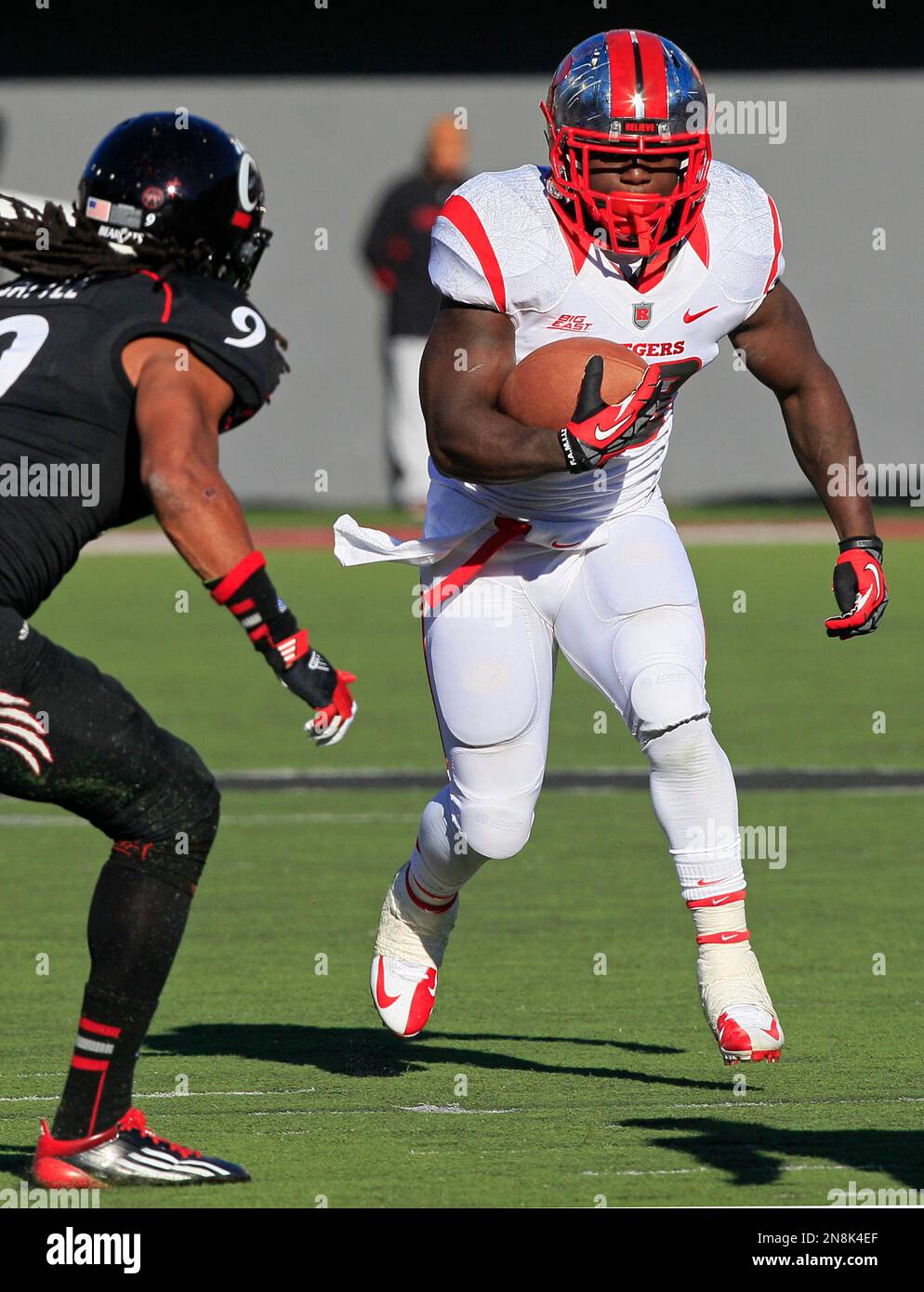 Rutgers running back Jawan Jamison runs against Cincinnati defensive ...