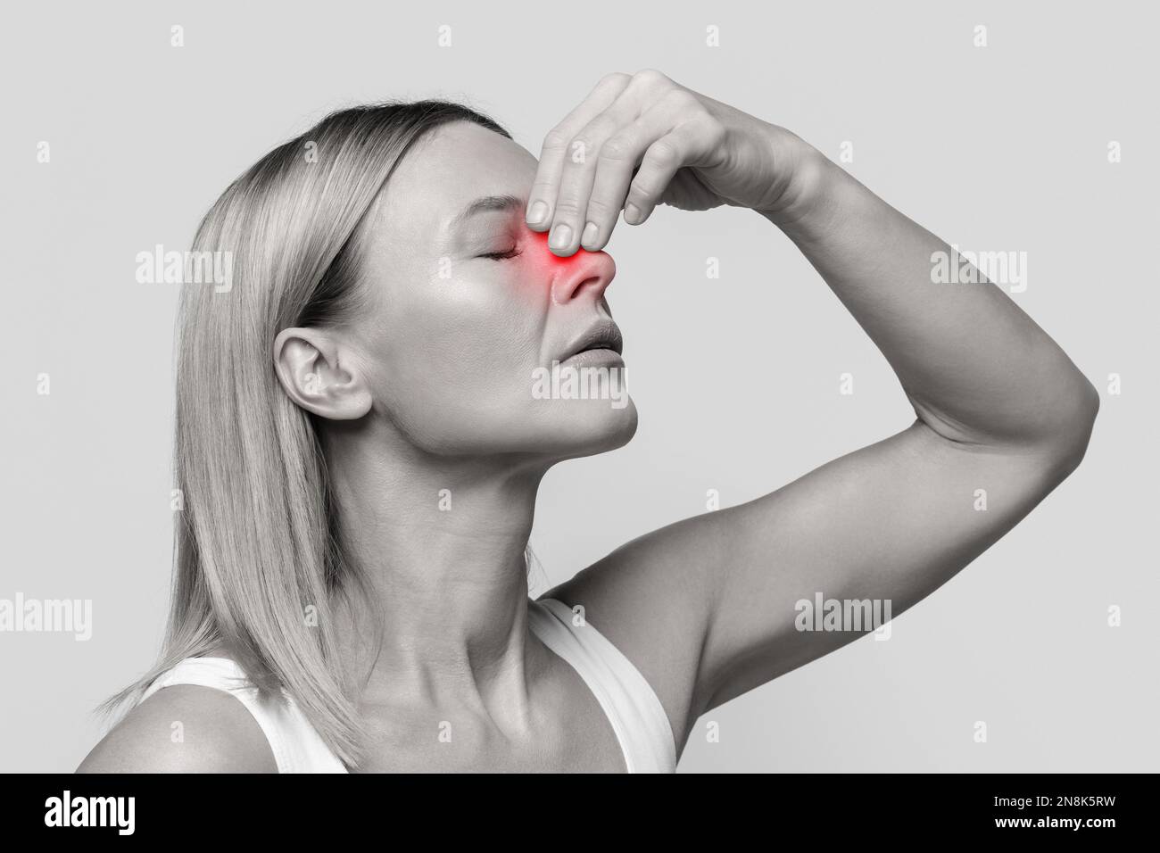 Middle aged woman suffering from nasal bleeding, closeup Stock Photo ...