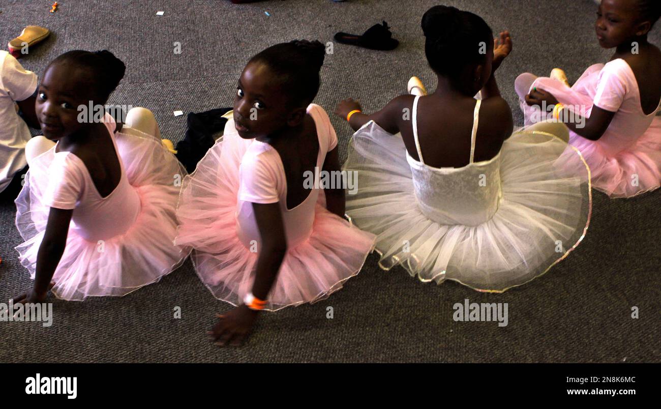 Young ballerinas prepare to go on stage to perform a dance in Alexandra Township, north of ...