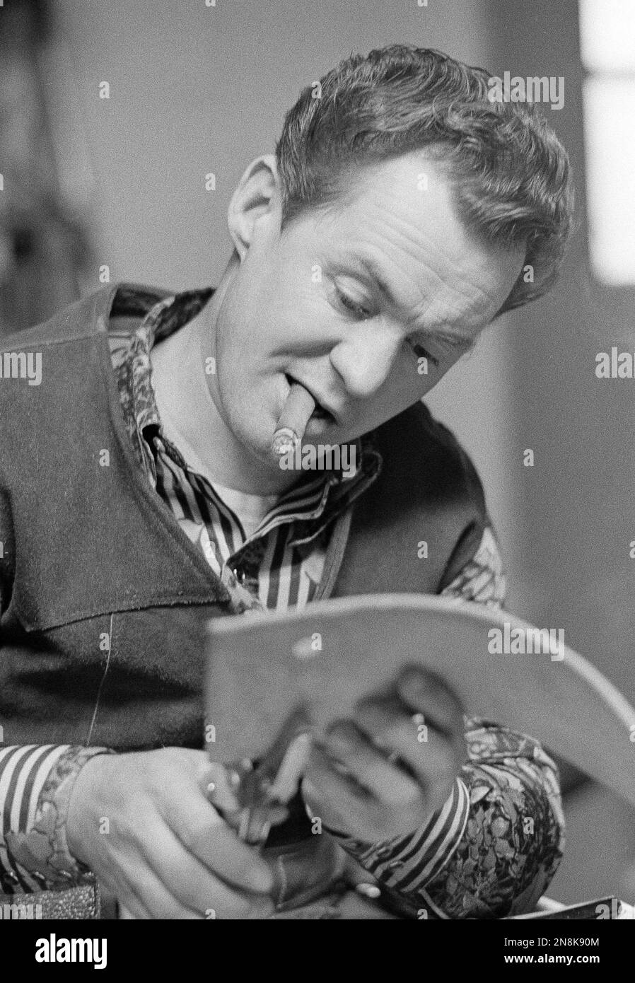 Jockey Ron Turcotte is shown smoking a cigar at home in New York, Dec ...