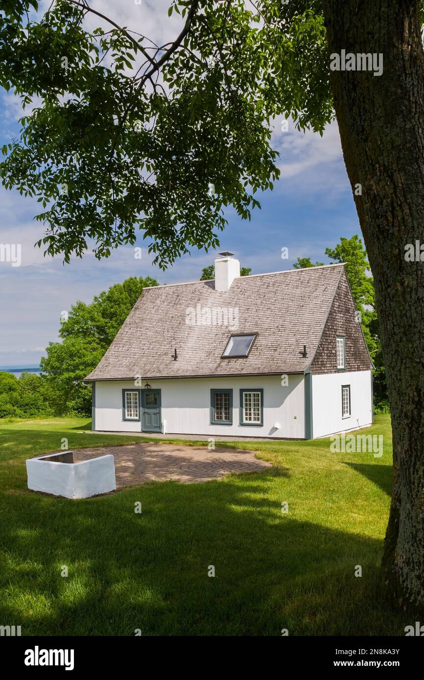 Rear view of old 1809 French regime cottage style home with white ...