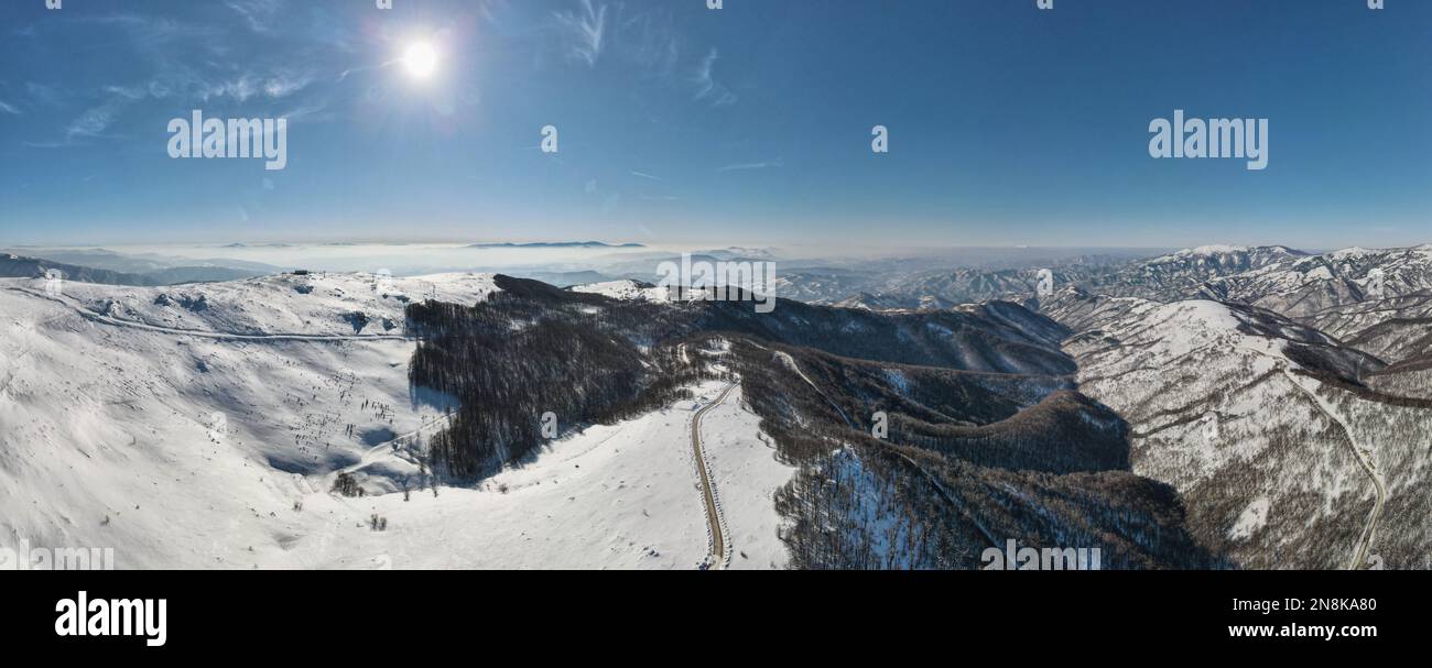 Stara Planina Babin Zub mountain in serbia covered with snow with road ...