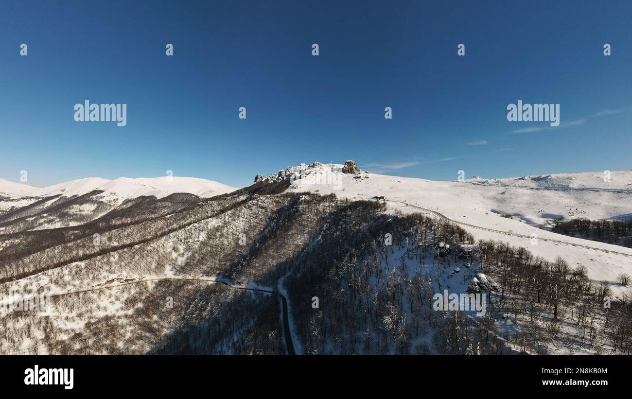 Stara Planina Babin Zub mountain in serbia covered with snow with road ...