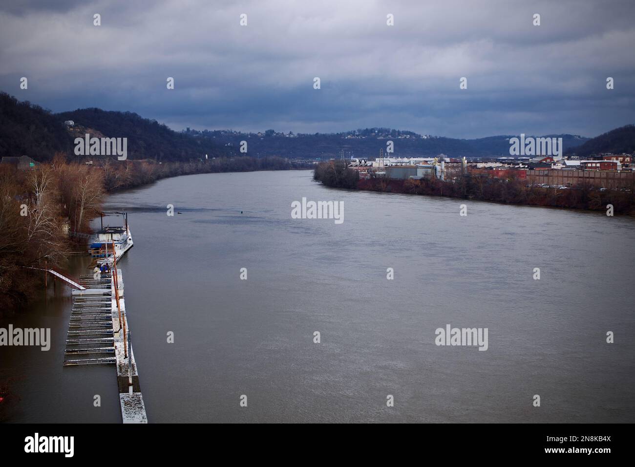 An aerial view of the Allegheny River surrounded by trees in Pittsburgh ...